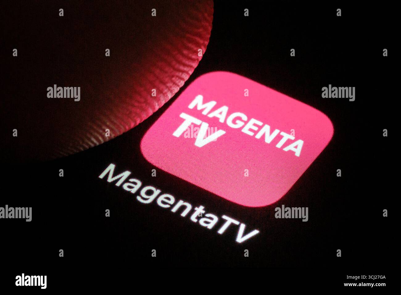 The Magenta TV app is displayed on a smartphone screen. Berlin ...