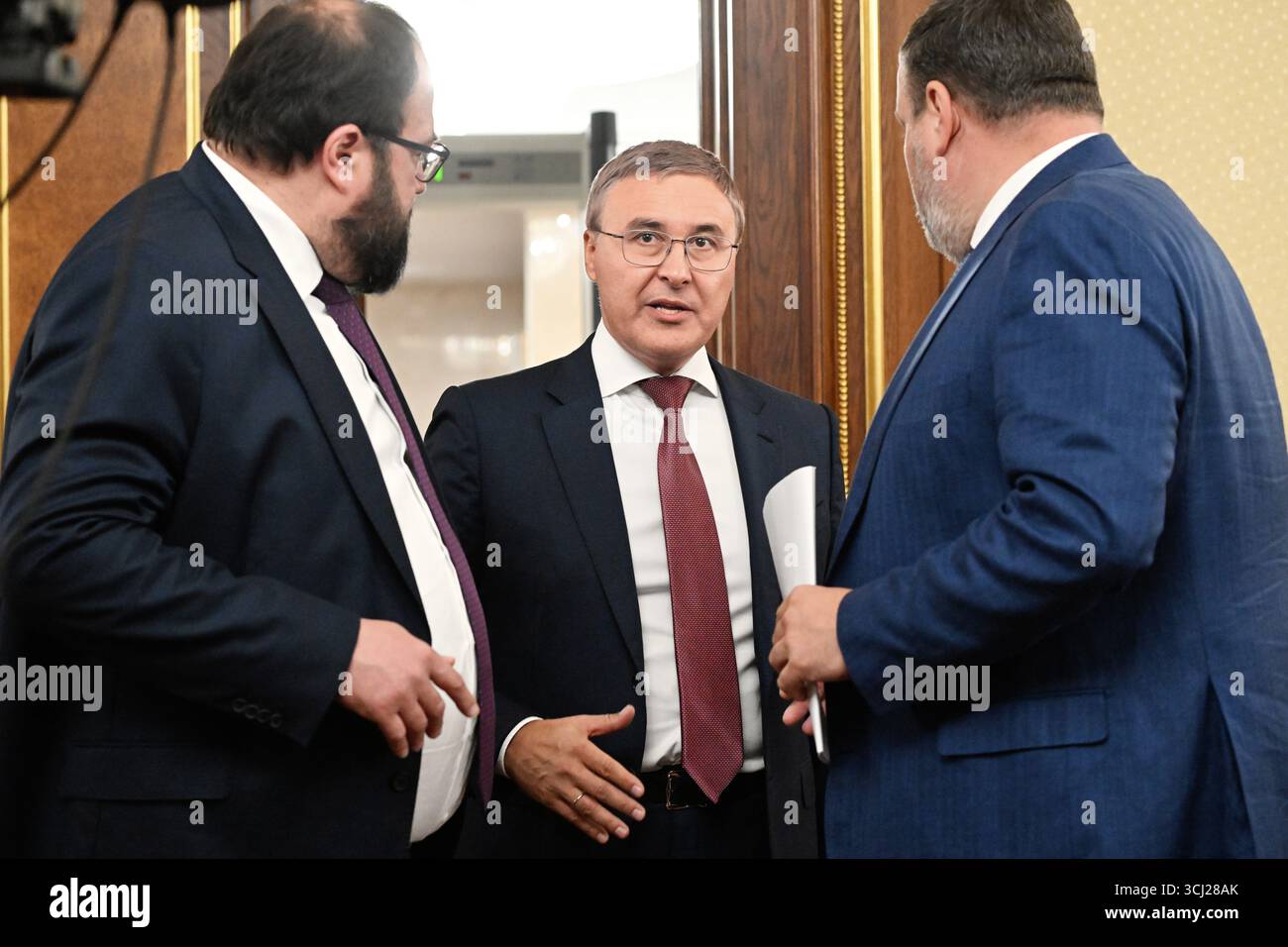 From left to right: Russian Minister of Digital Development ...