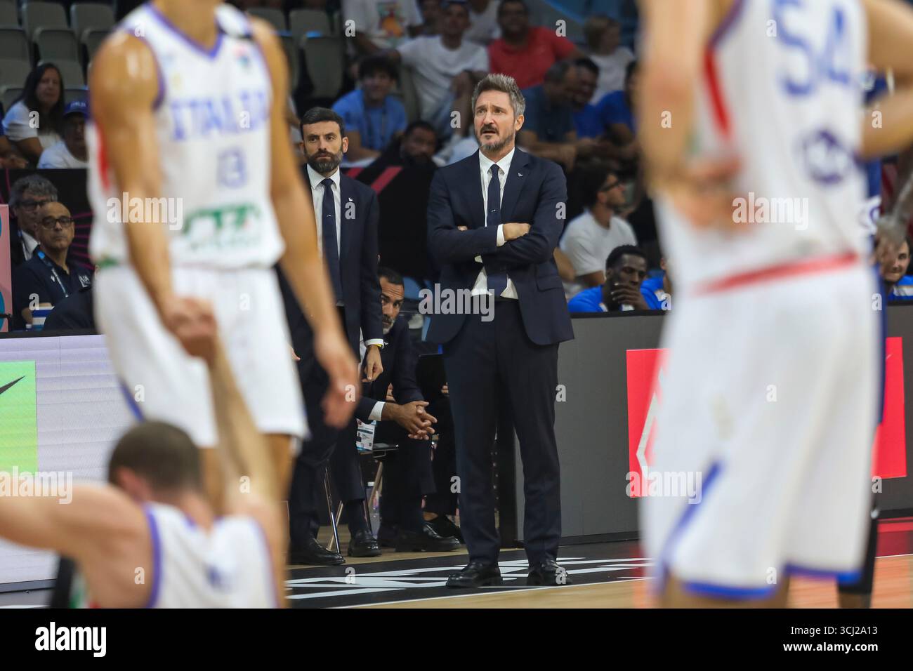 Italy head coach GIANMARCO POZZECCO is seen during the game. Italy ...