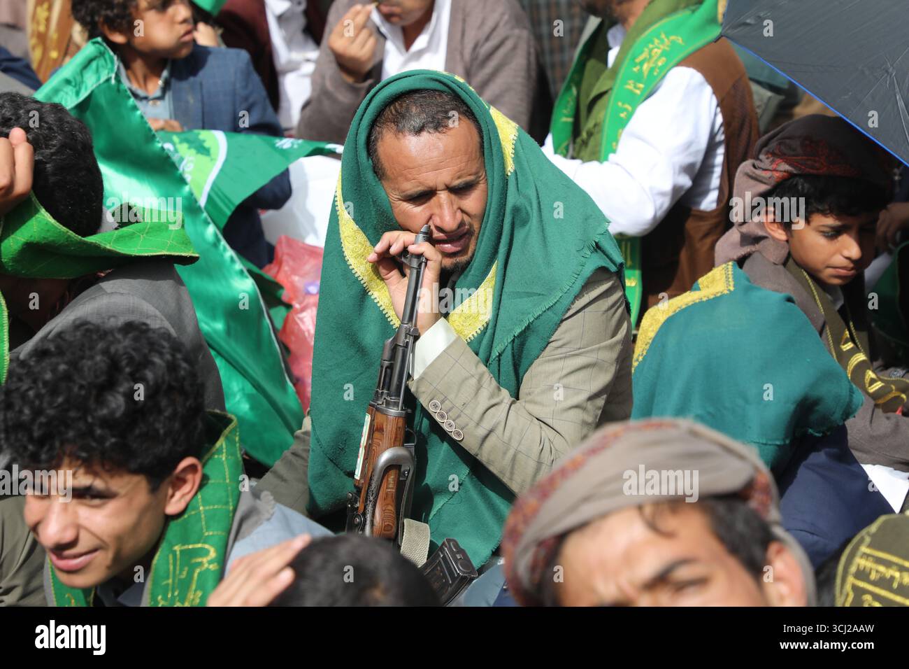 A Yemeni man attends the Mawlid celebration to mark the birthday of the prophet Muhammad, in ...