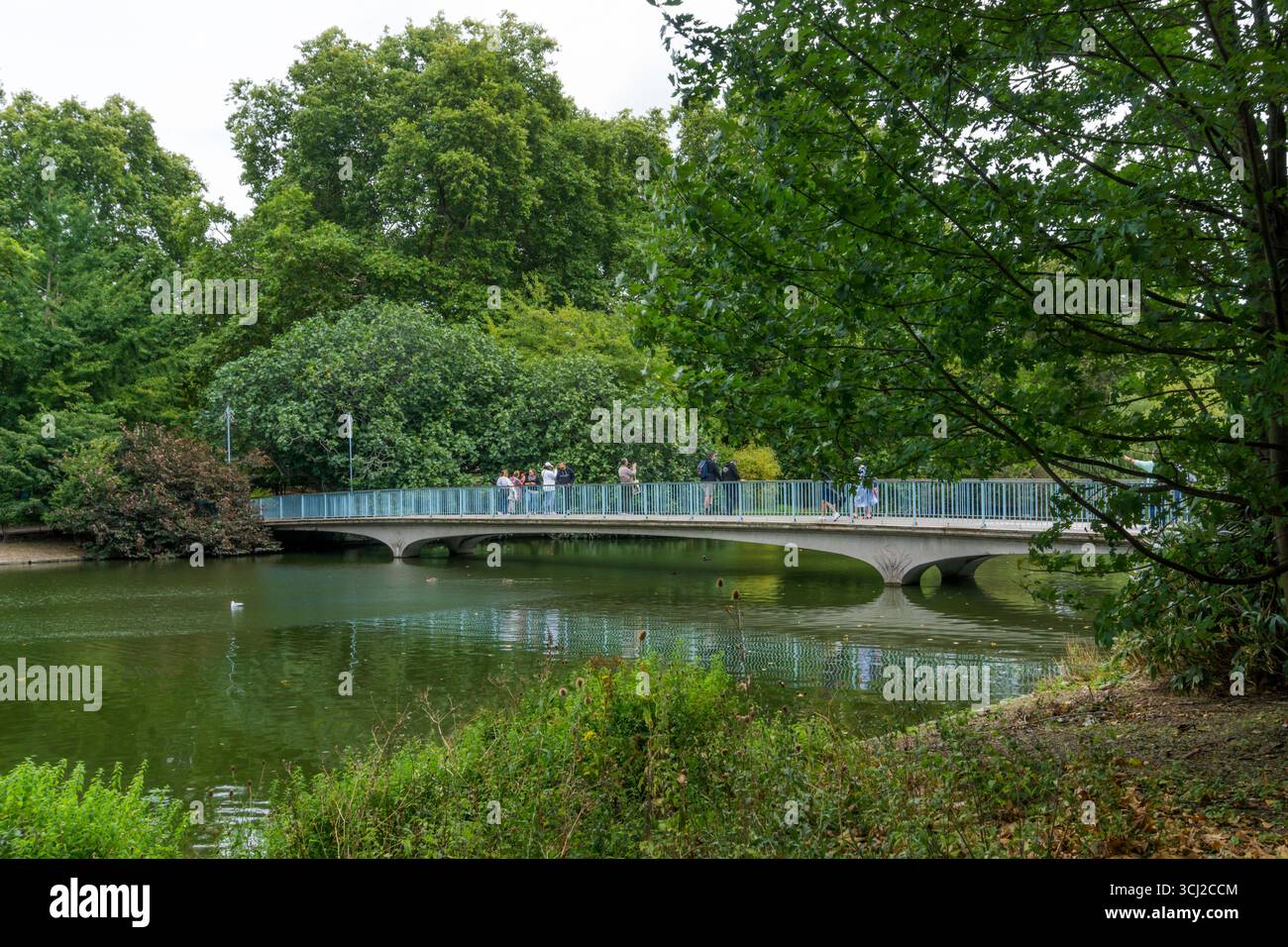 The blue bridge over the lake in St James's Park, London. Designed by ...