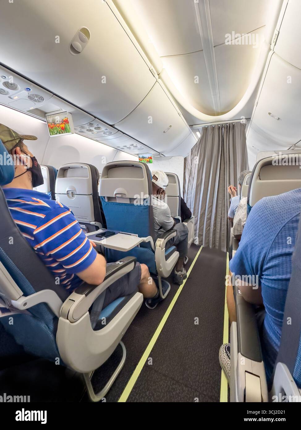 Interior view of a singapore airways A320 commercial airplane cabin ...