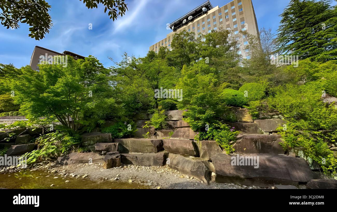 Kotodai Park in Sendai, Japan, with lush greenery and stones in the ...