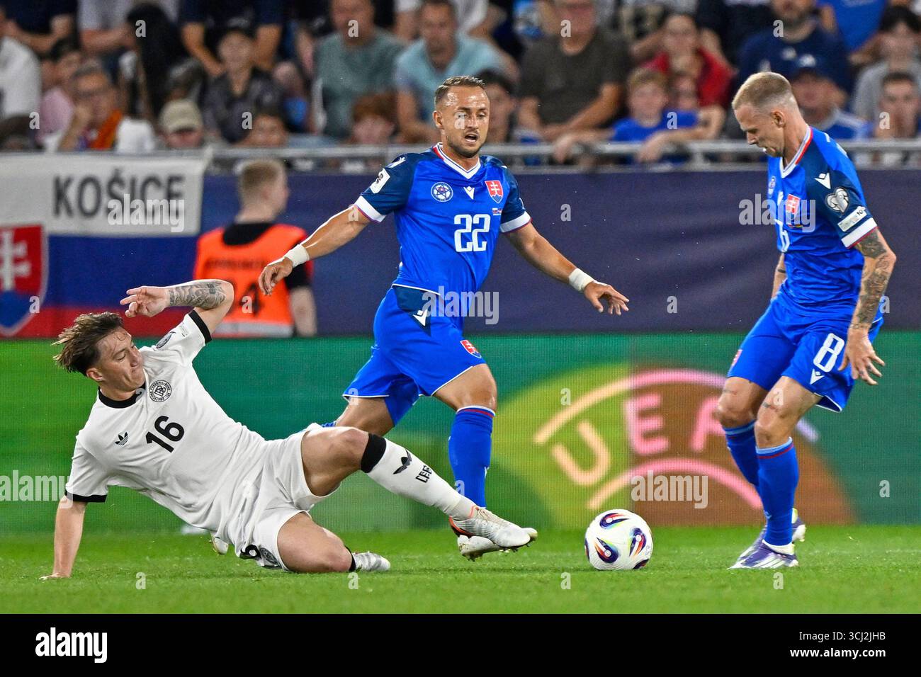 Germany's Angelo Stiller slides in to tackle Slovakia's Ondrej Duda ...