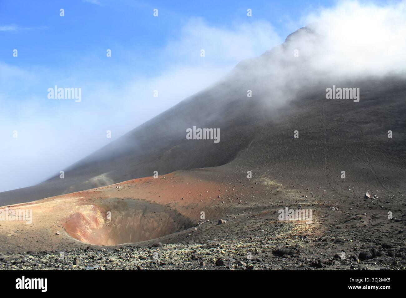 Fogo Volcano (Pico do Fogo) with volcanic landscape and clouds, Fogo ...