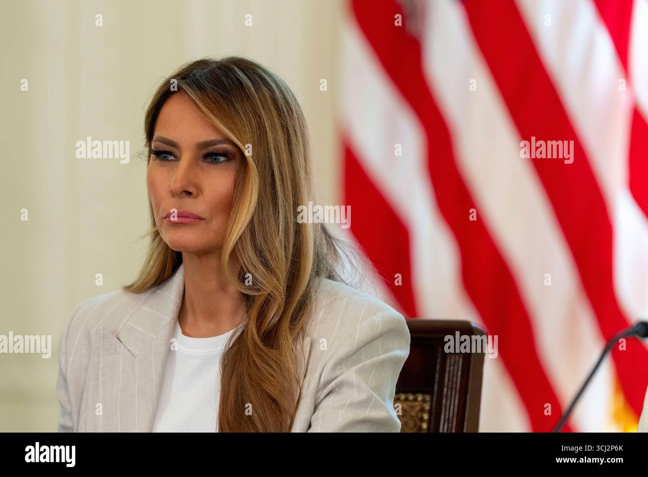 First lady Melania Trump listens during a meeting of the White House ...