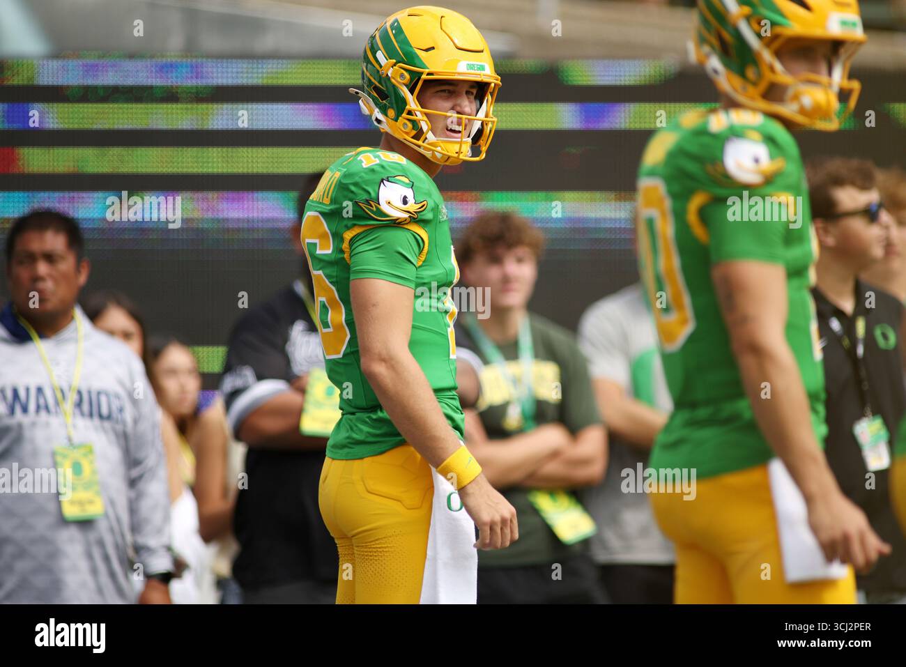 Oregon quarterback Austin Novosad (16) warms up before an NCAA college ...