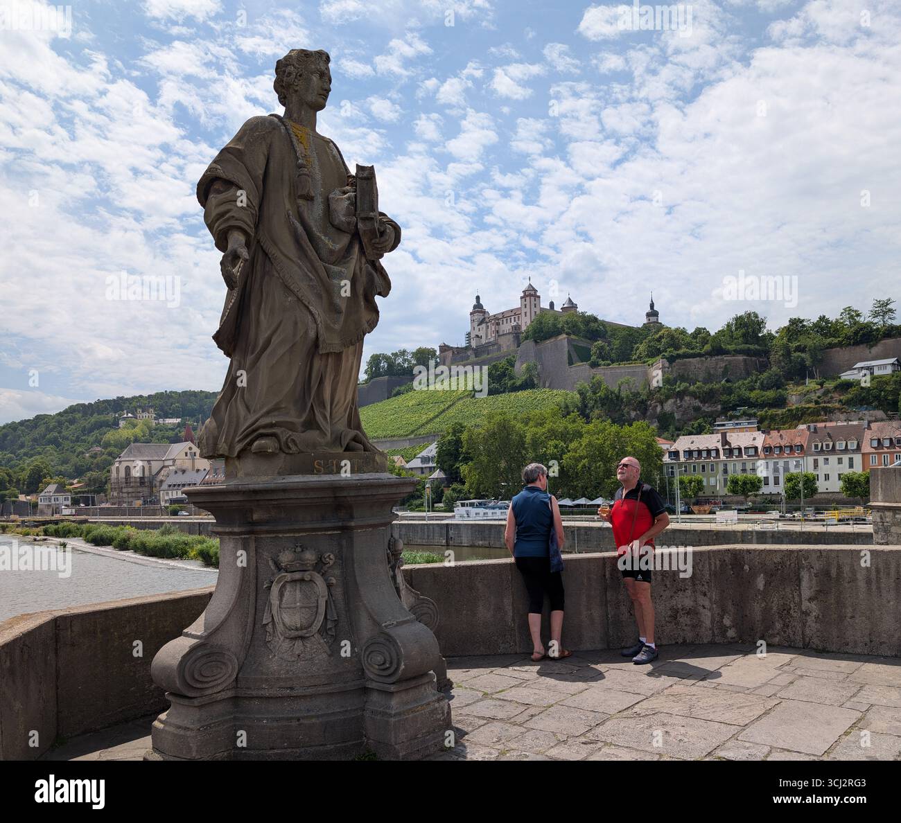 The historic bridge in Würzburg over the Main River is a pedestrian ...