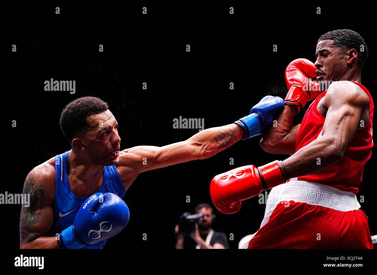 Kelyn Cassidy (left) in action against Noel Pacheco in their Men's 80kg ...