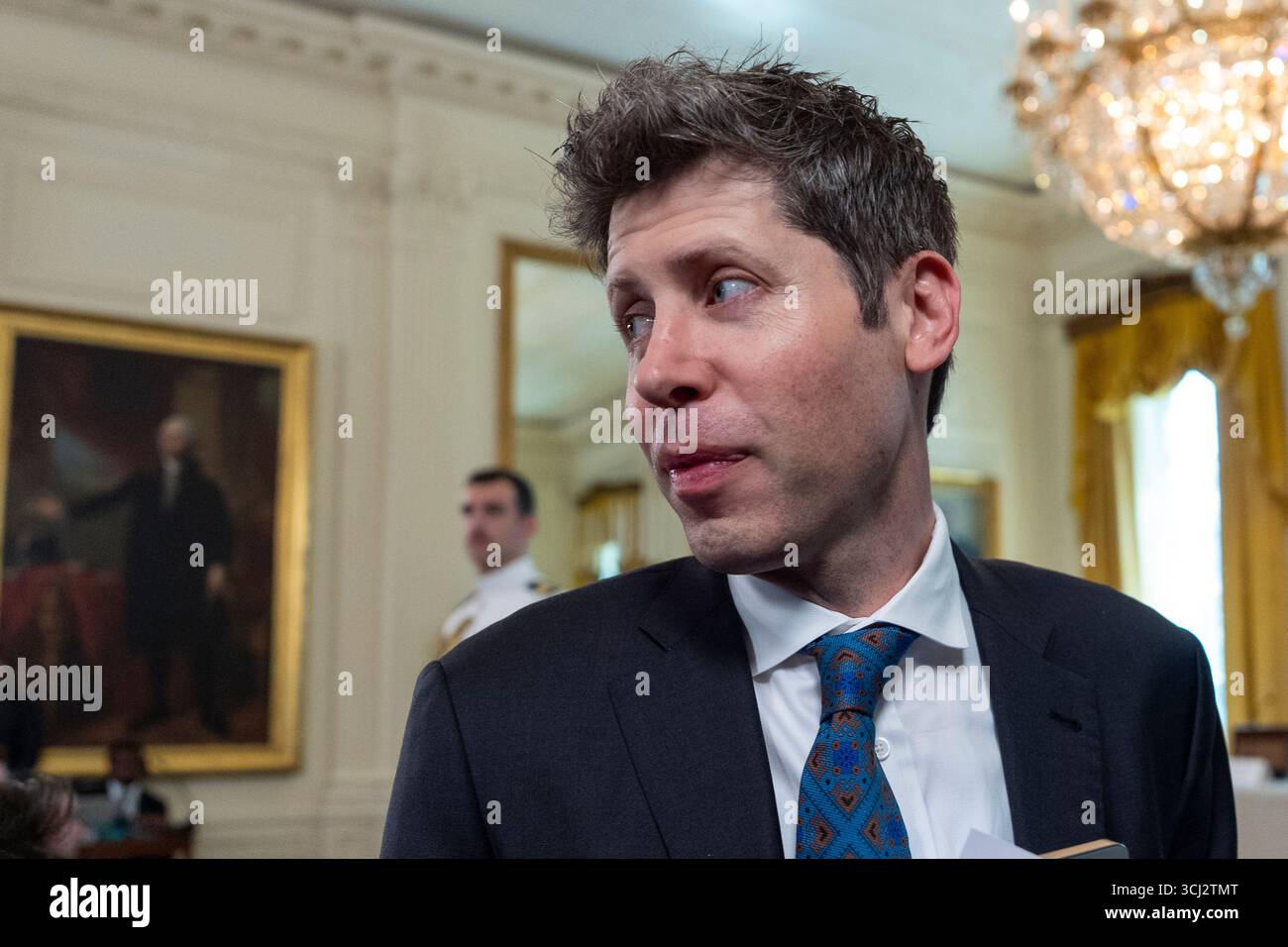 Sam Altman, CEO of OpenAI, takes his seat before a meeting of the White ...