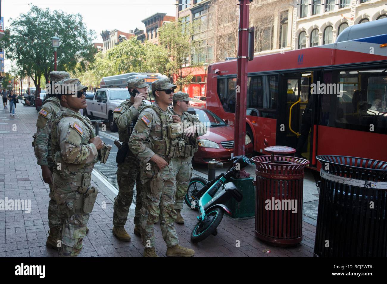 Members of the Mississippi National Guard watch as Metro Transit Police ...