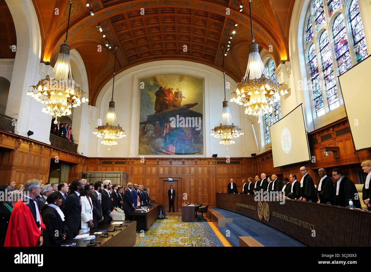 FILE - Judges, right, arrive to the International Court of Justice on ...