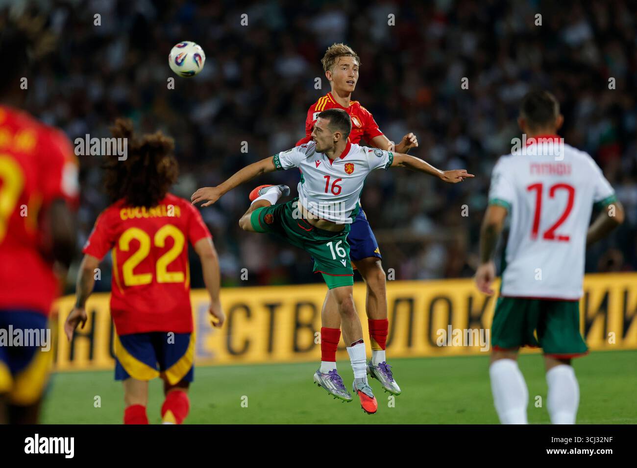Spain's Robin Le Normand, top, and Bulgaria's Marin Petkov challenge ...
