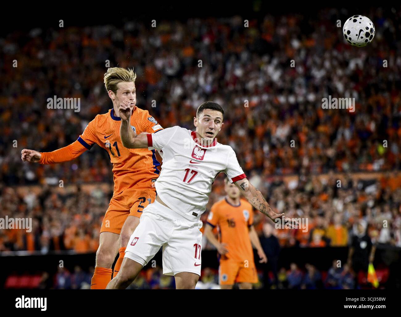 ROTTERDAM - (L-R) Frenkie de Jong of the Netherlands and Bartosz Slisz ...