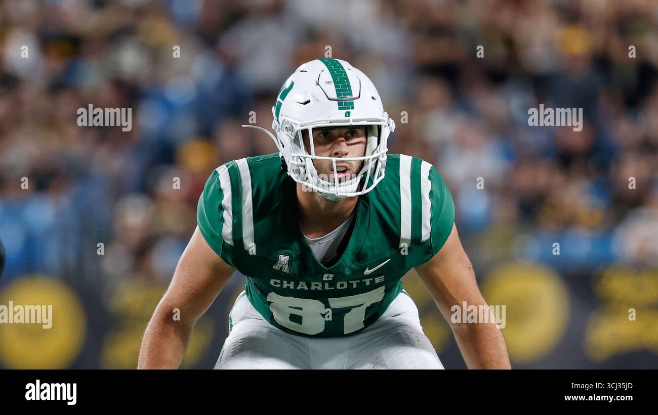 Charlotte tight end Jake Young (87) blocks during an NCAA football game ...