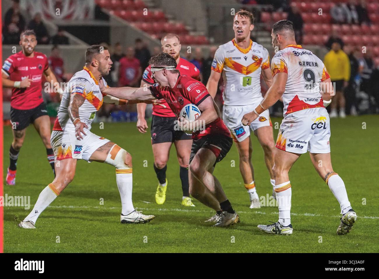 SALFORD, ENGLAND - September 4: Loghan Lewis of Salford Red Devils ...