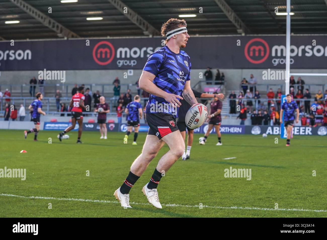 SALFORD, ENGLAND - September 4: Loghan Lewis of Salford Red Devils pre ...