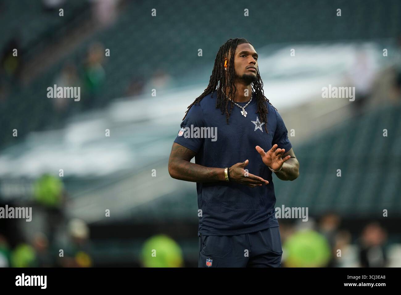 Dallas Cowboys wide receiver CeeDee Lamb walks across the field before ...