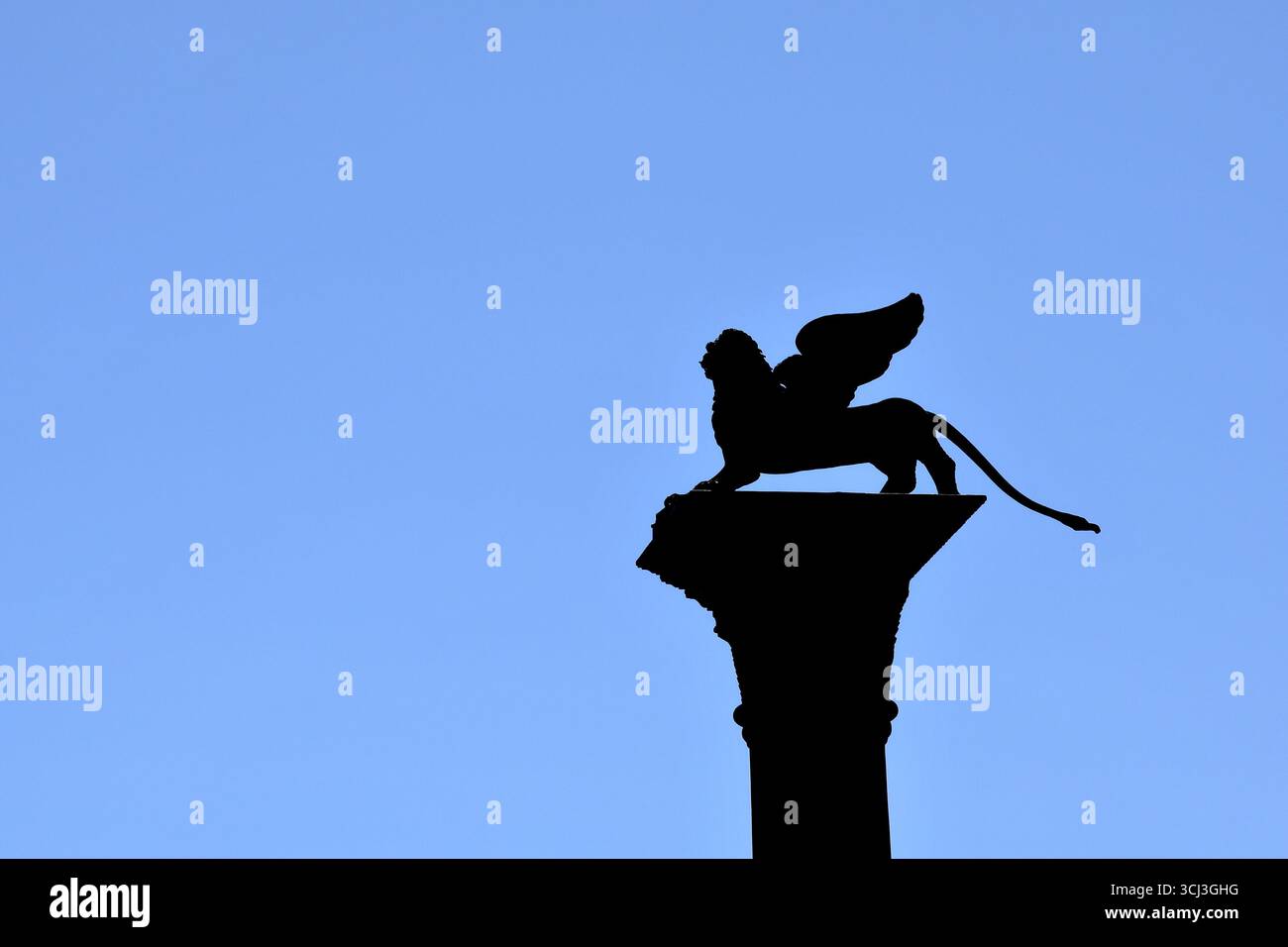 Silhouette of the Column of St Mark or Column of the Lion, with the the ...