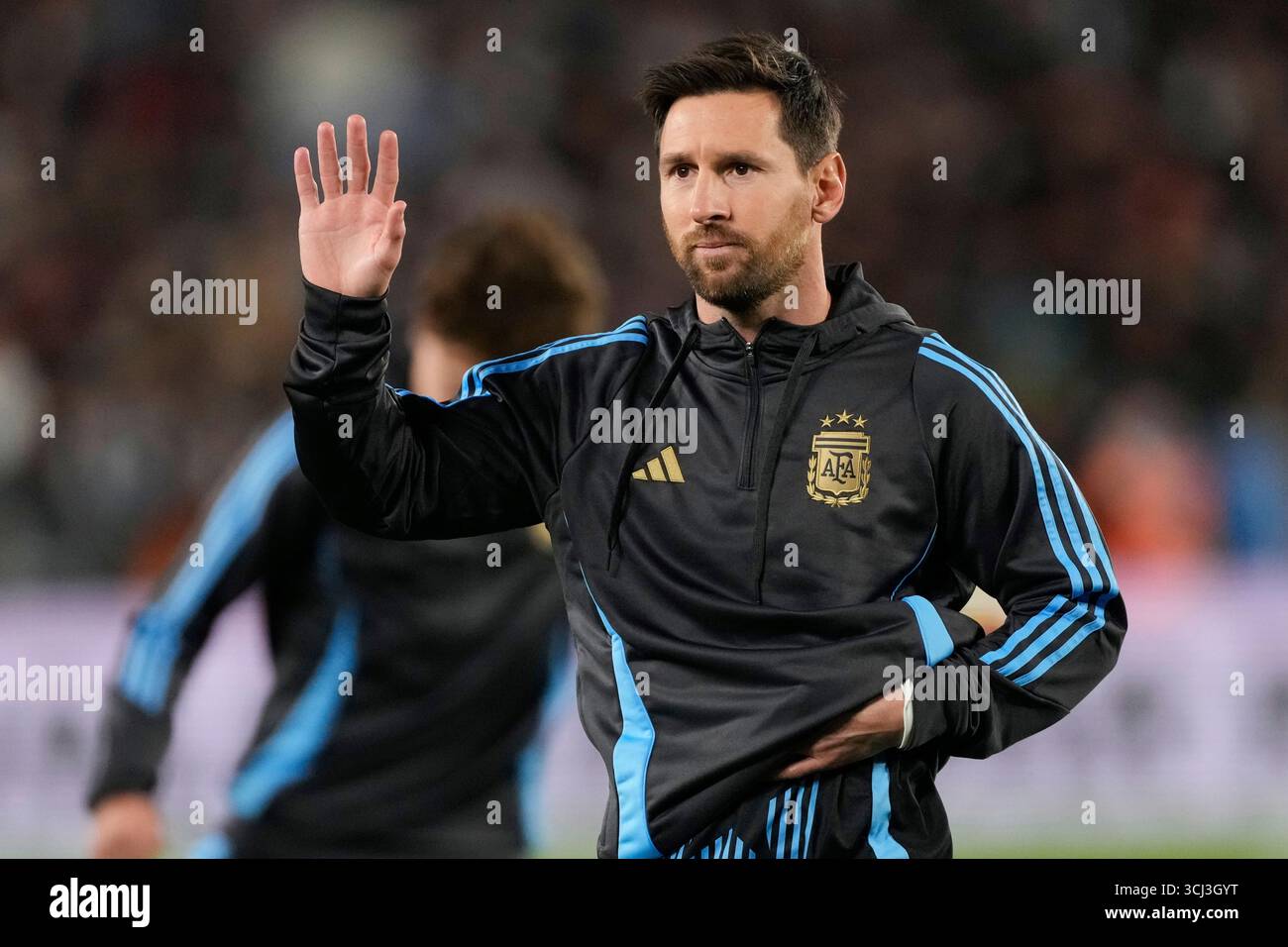 Argentina's Lionel Messi waves during the warm up prior to a World Cup ...