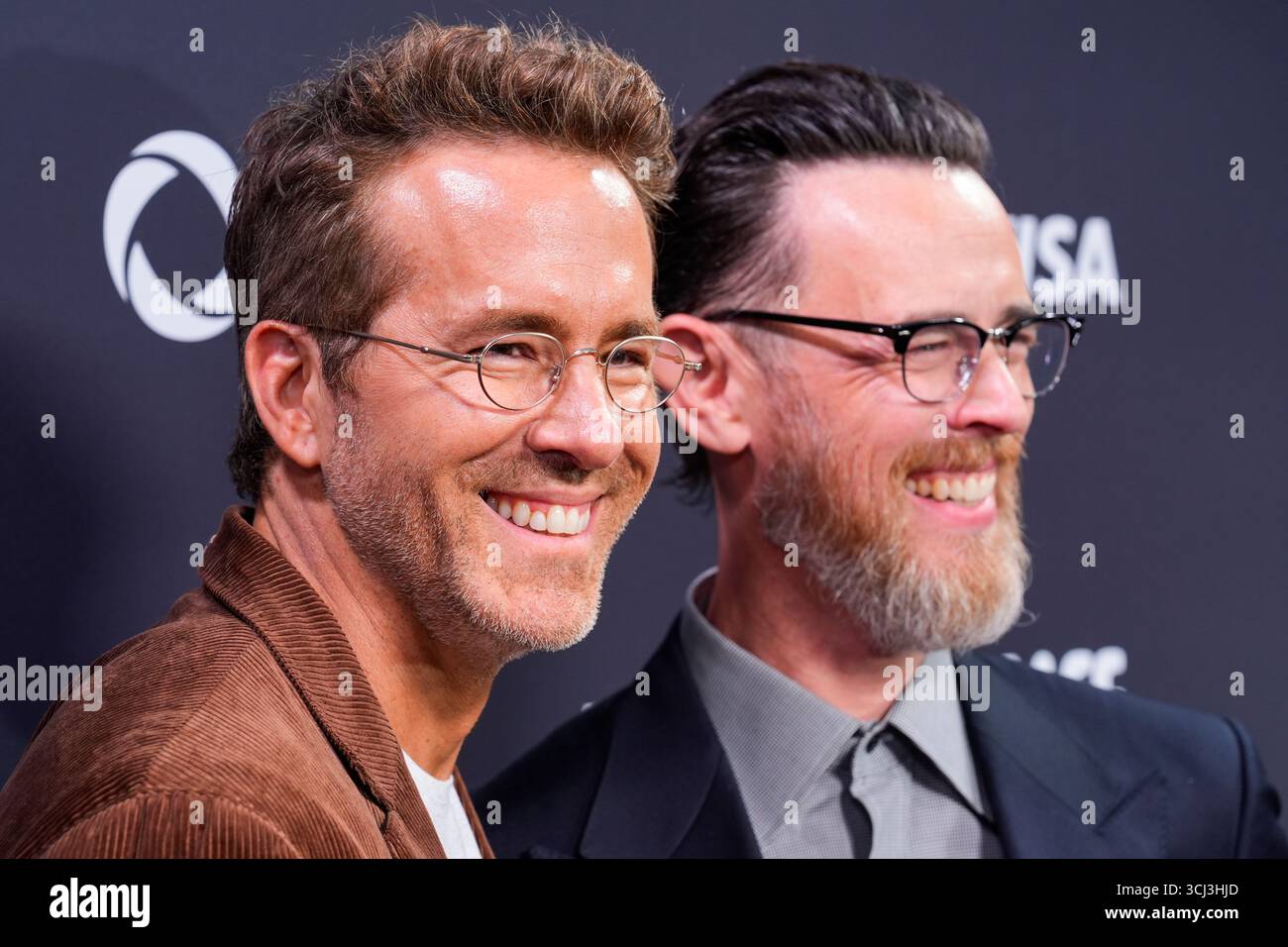 Ryan Reynolds, left, and director Colin Hanks attend the premiere of ...