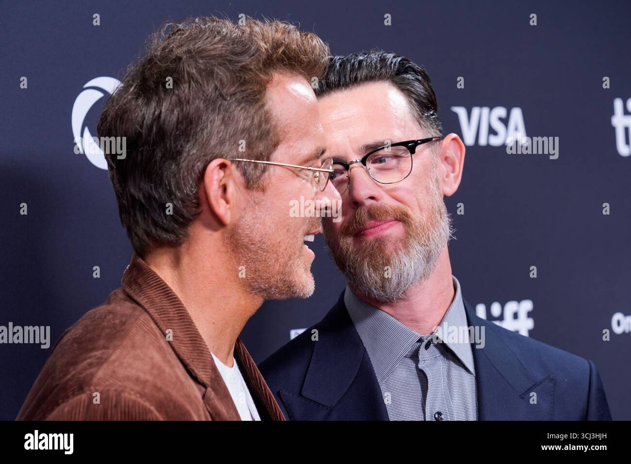 Ryan Reynolds, left, and director Colin Hanks attend the premiere of ...