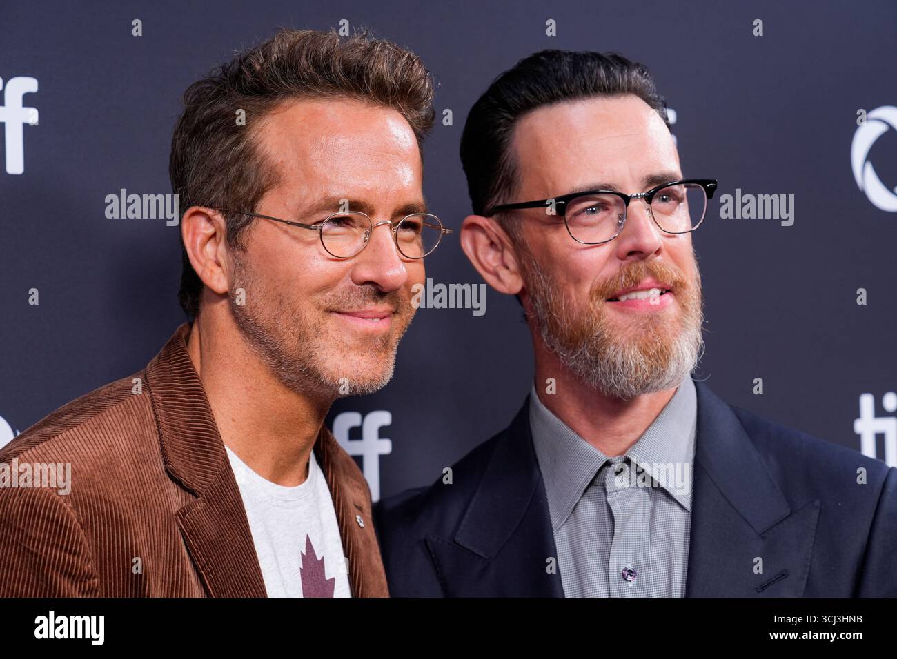Ryan Reynolds, left, and director Colin Hanks attend the premiere of ...