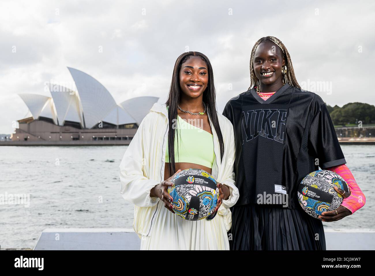 Jamaican netball player Shimona Jok (left), and Ugandan player Mary ...