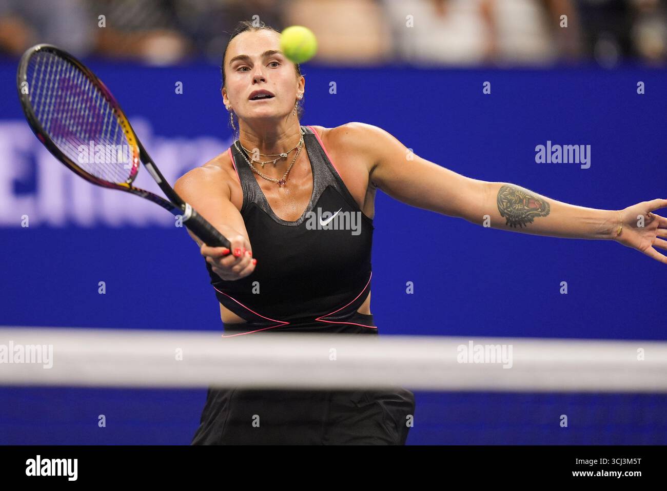 Aryna Sabalenka, of Belarus, returns a shot to Jessica Pegula, of the ...