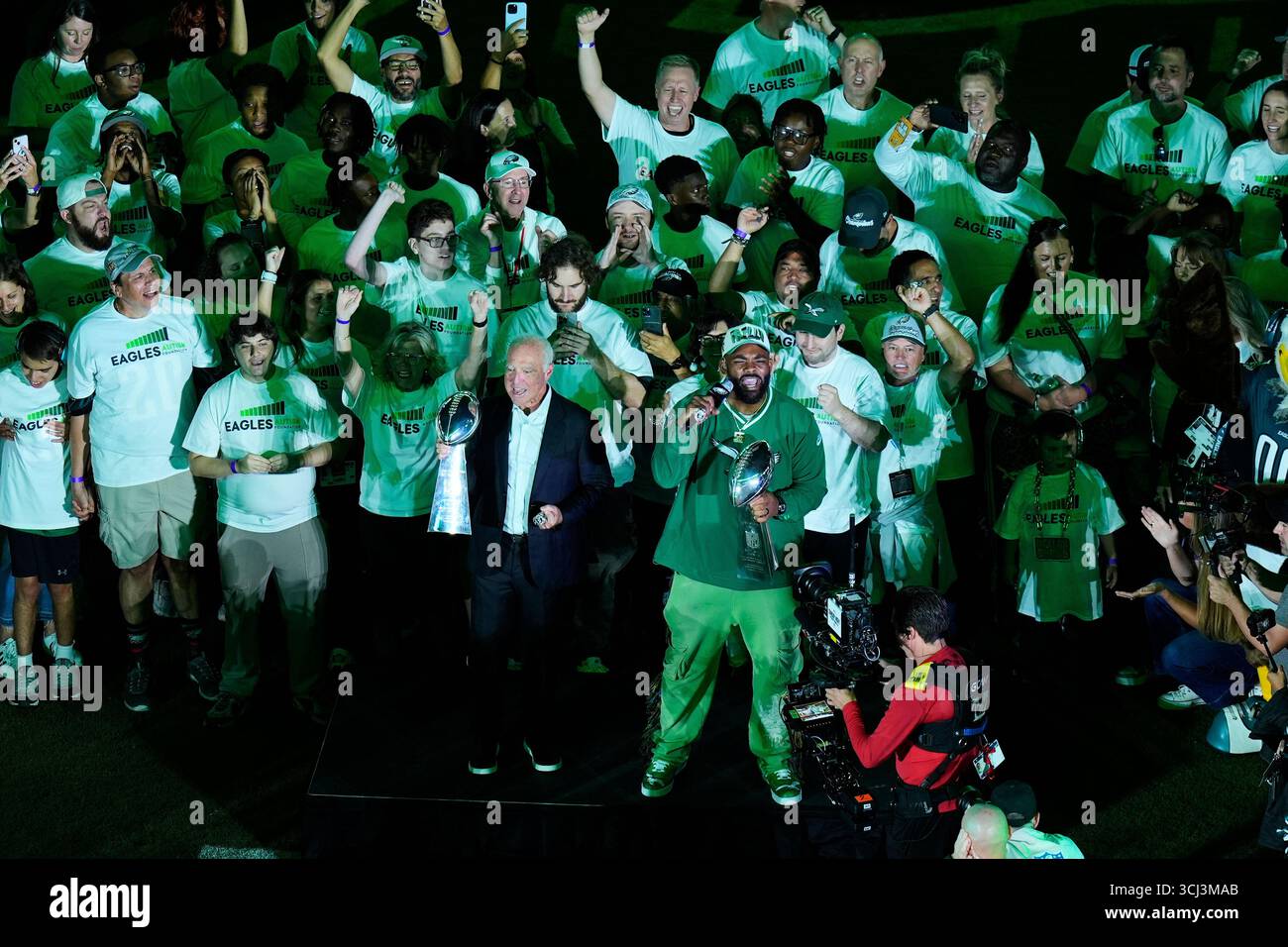 Philadelphia Eagles team owner Jeffrey Lurie, center left, and Brandon ...