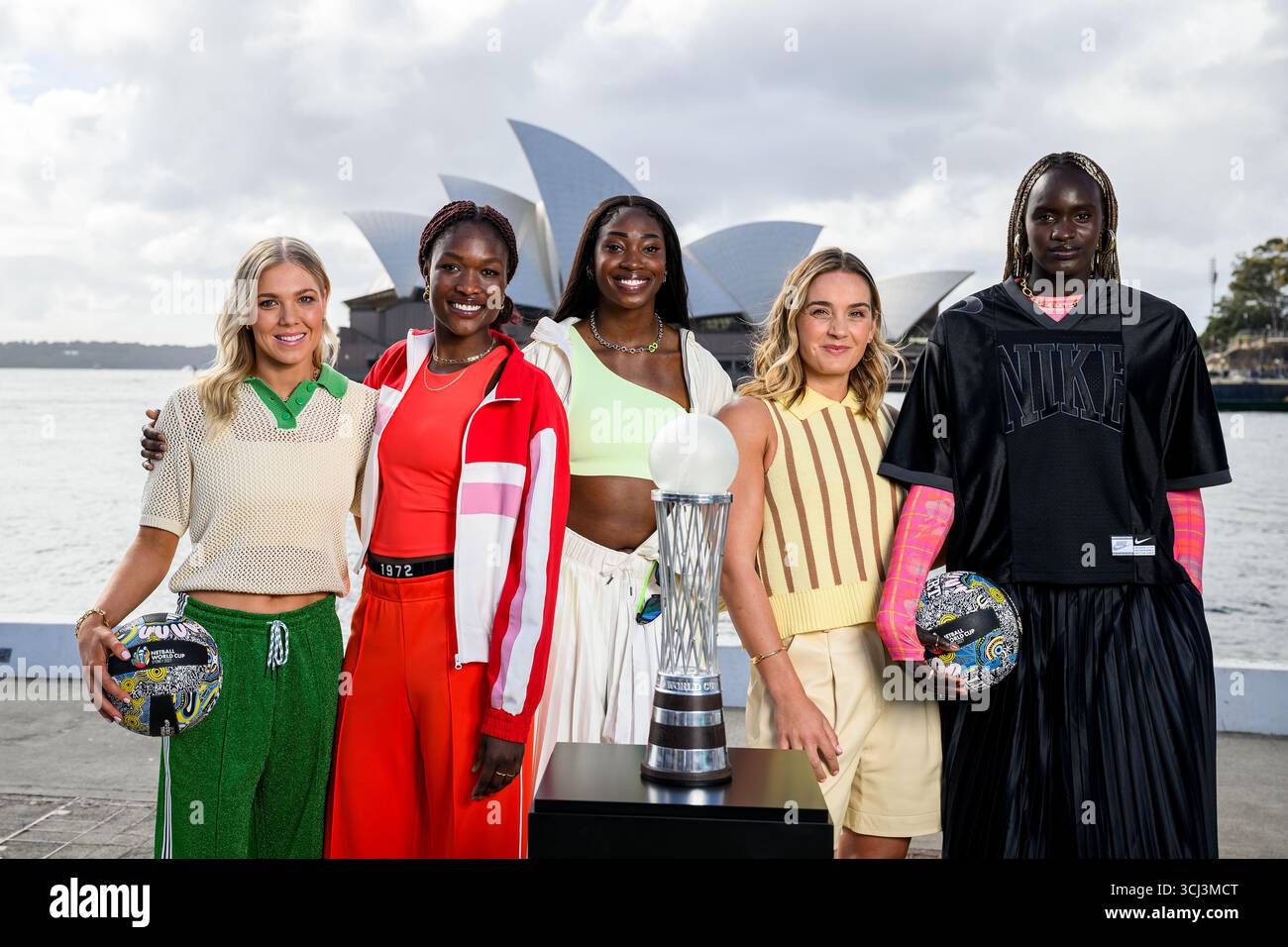 (L-R) Netball players Kate Moloney (Australia), Sunday Aryang ...
