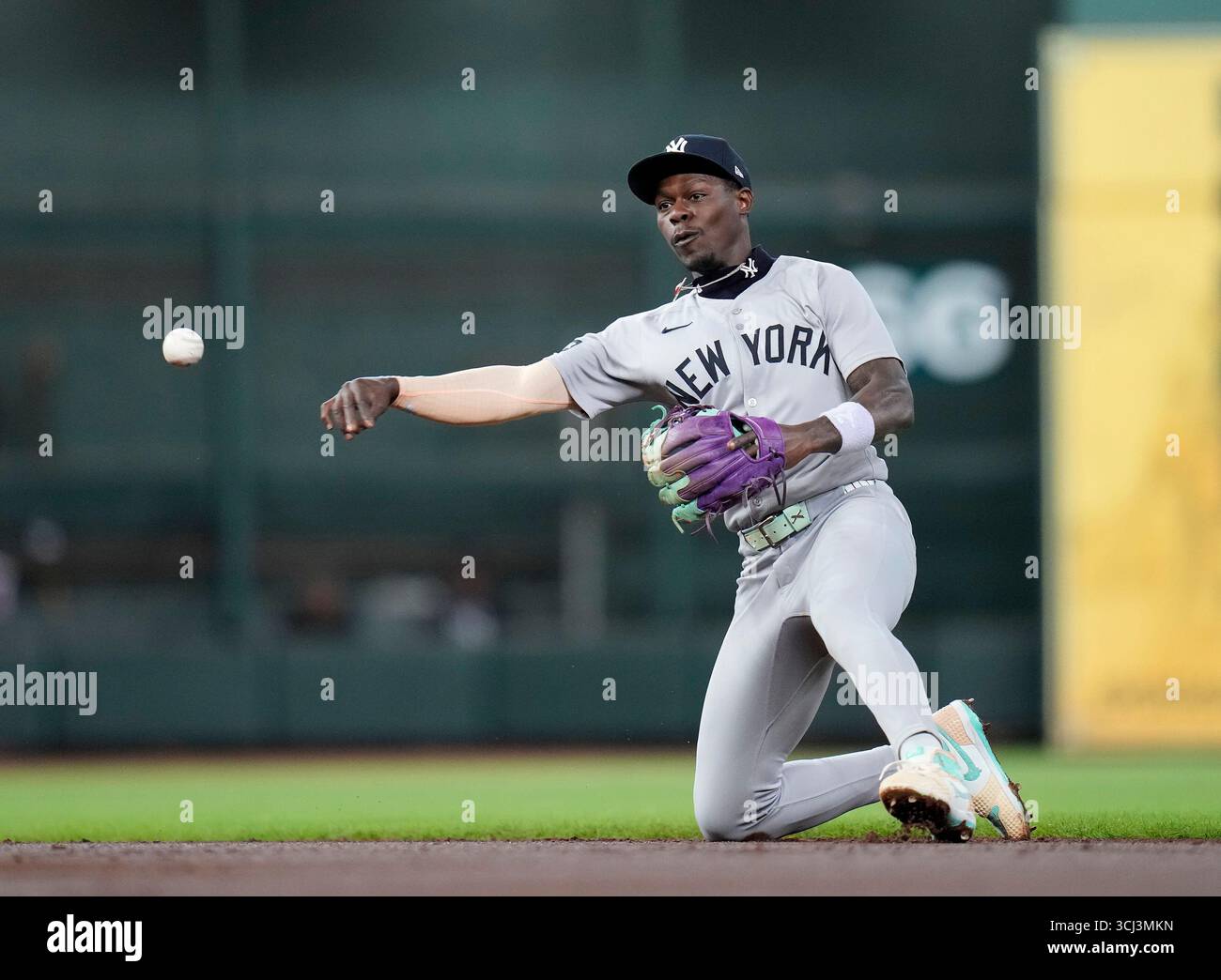 New York Yankees' second baseman Jazz Chisholm Jr. makes the throw to first base as Houston ...