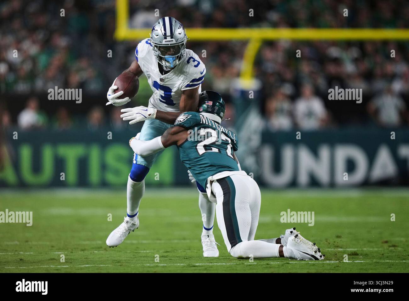 Dallas Cowboys wide receiver George Pickens (3) is stoppe by ...
