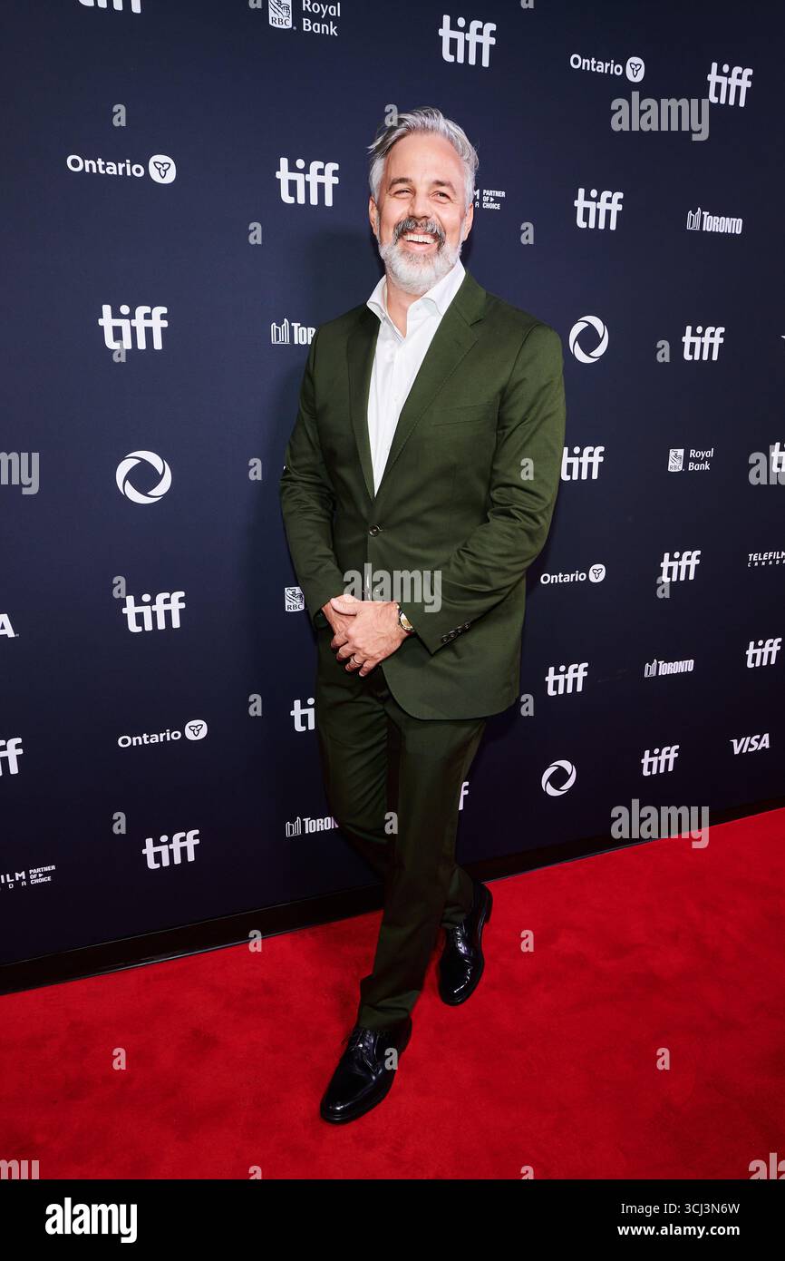 Editor and Producer Shane Reid is photographed on the red carpet for ...