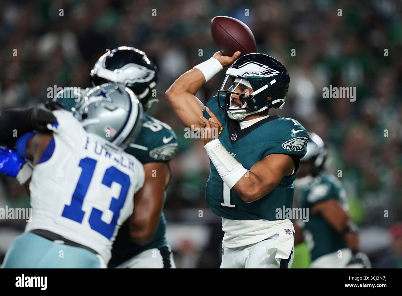 Philadelphia Eagles quarterback Jalen Hurts throws a pass in the first half of an NFL football ...