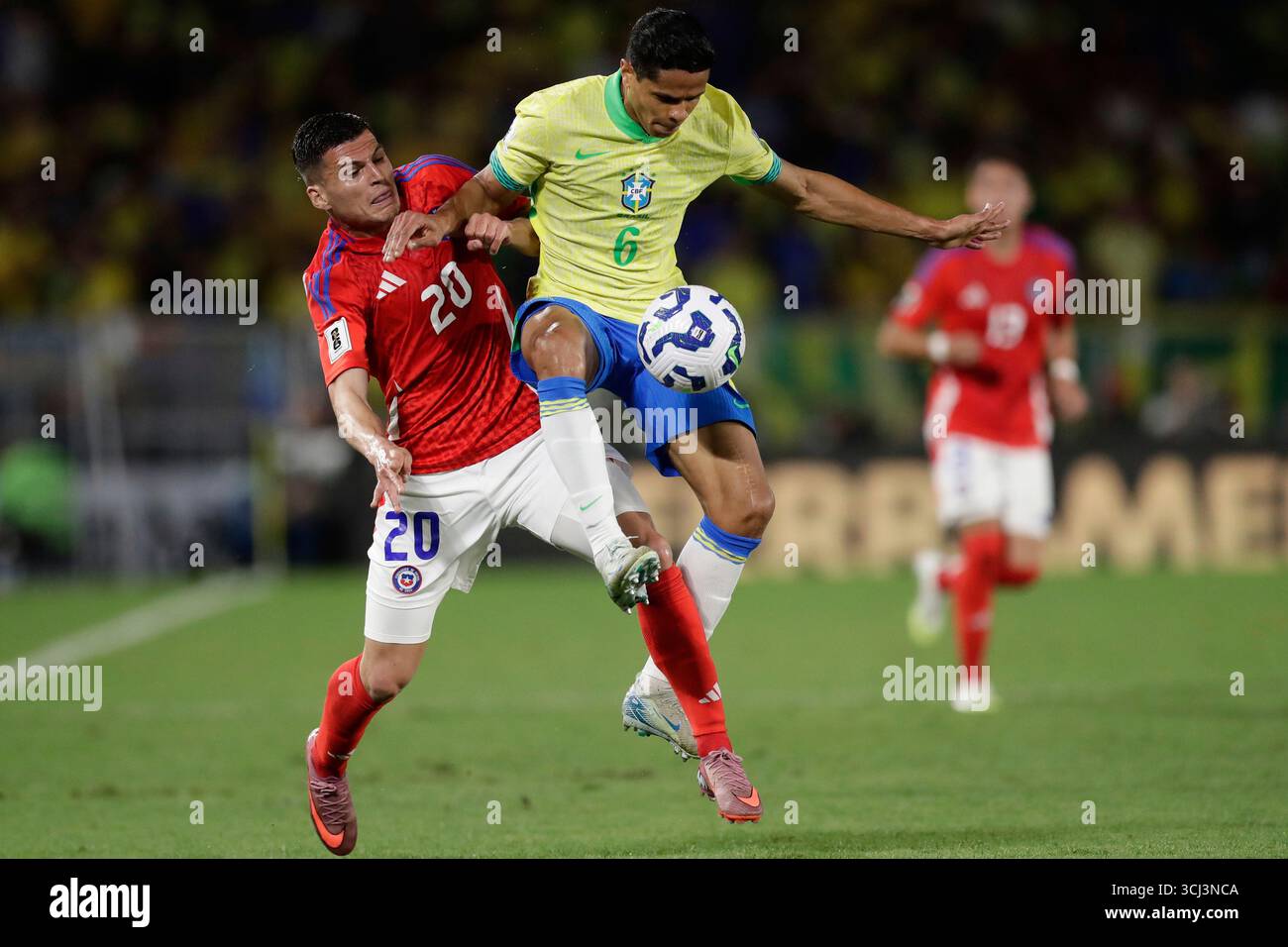 Brazil's Douglas Santos, right, and Chile's Lucas Cepeda fight for the ...