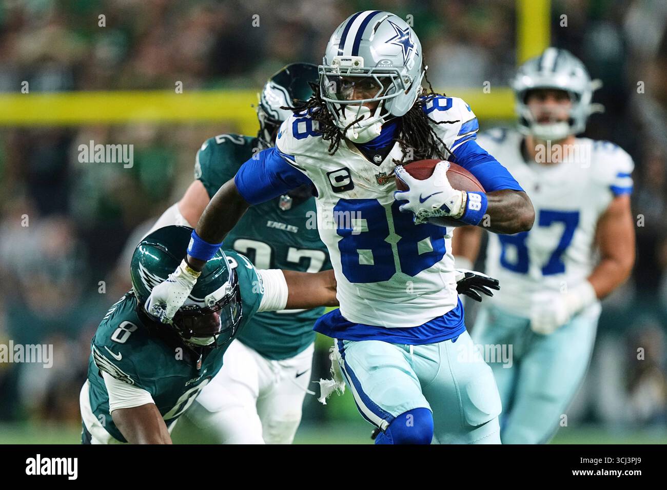 Dallas Cowboys wide receiver CeeDee Lamb (88) gains yards after a catch ...