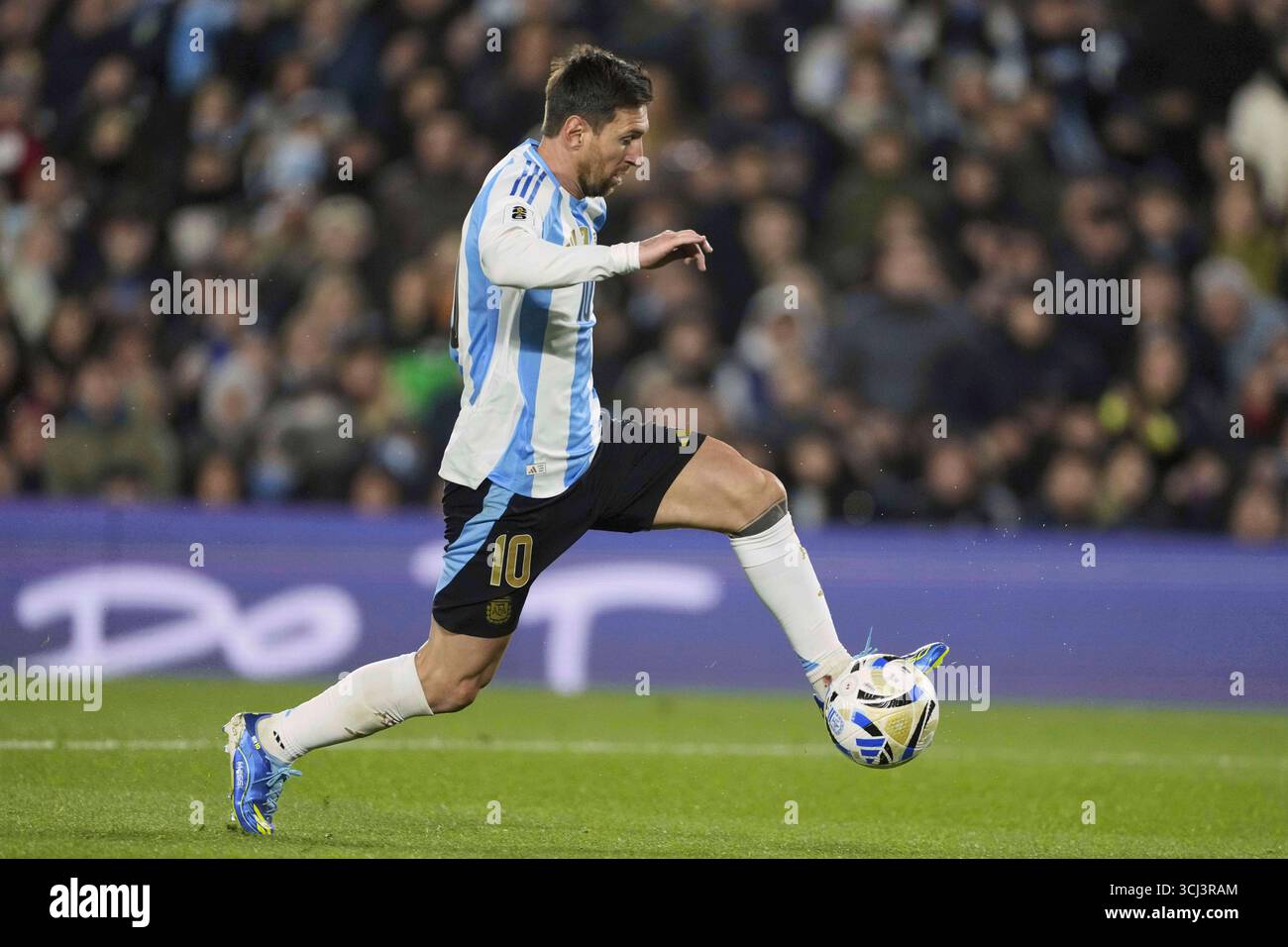 Argentina's Lionel Messi attacks against Venezuela during a World Cup ...
