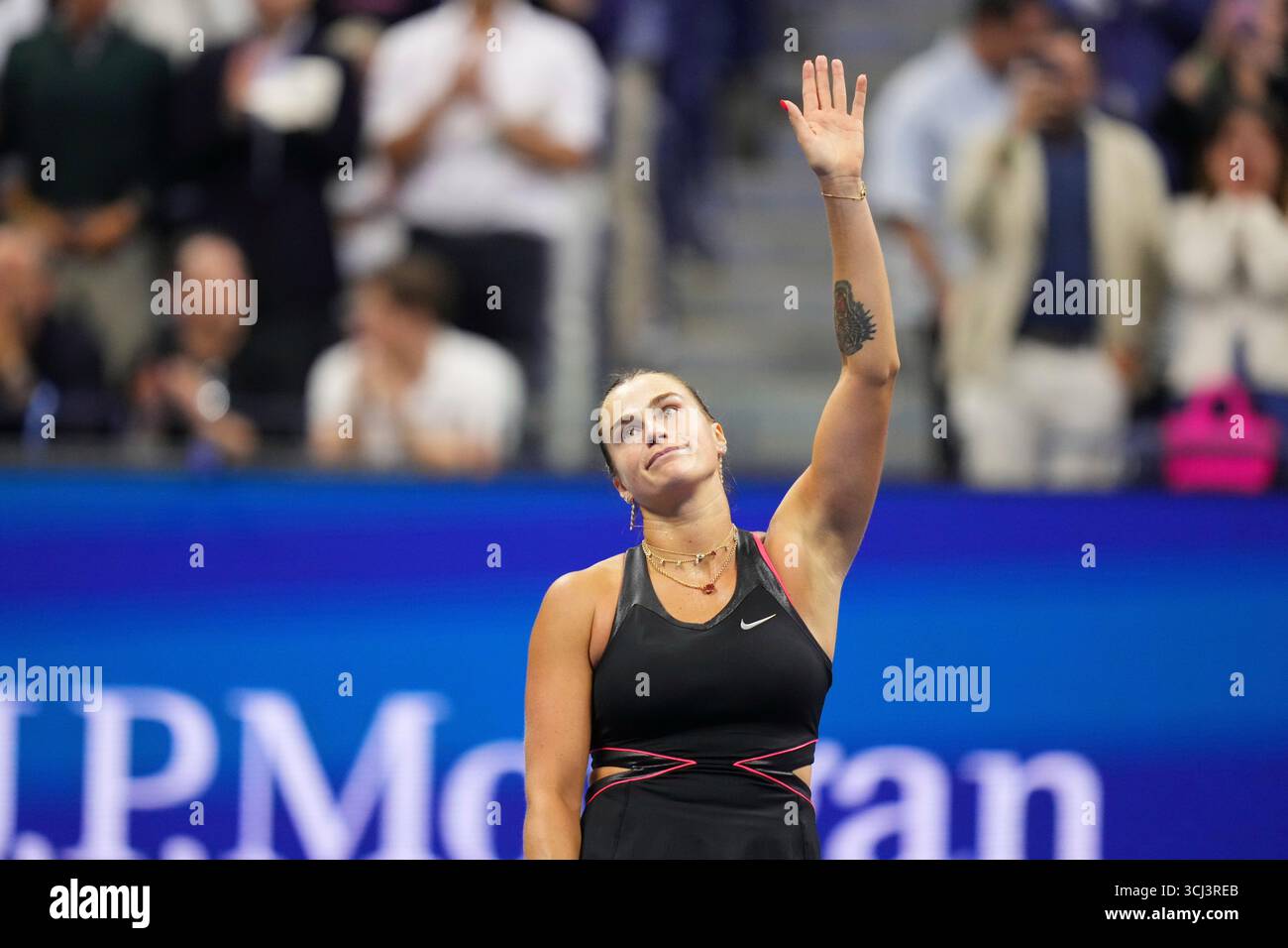 Aryna Sabalenka, of Belarus, waves to fans after defeating Jessica ...