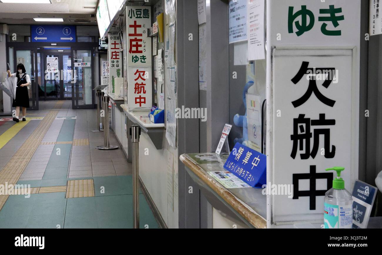Ferry ticket counter where notices of cancellations due to Typhoon No ...