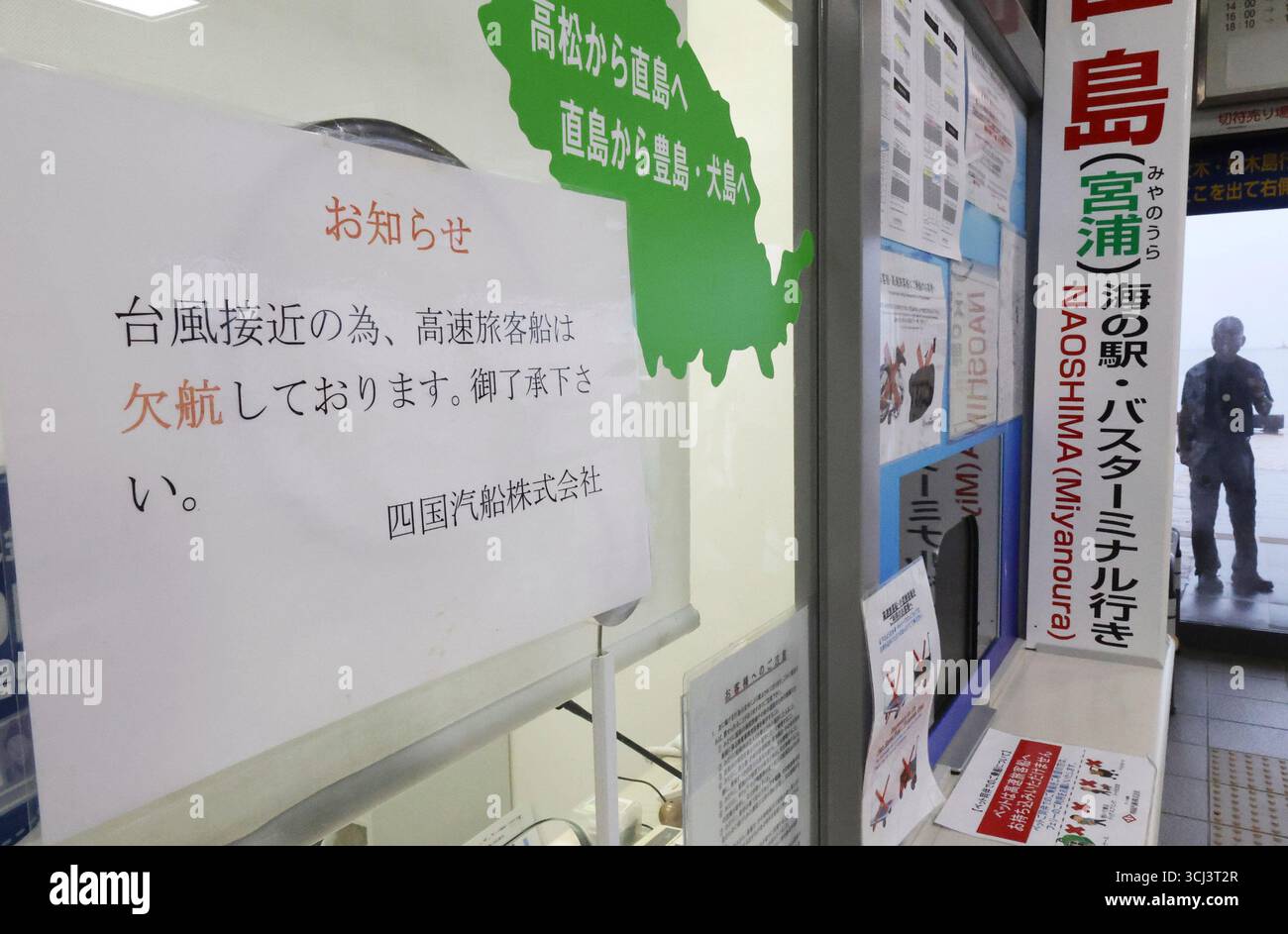 Ferry ticket counter where notices of cancellations due to Typhoon No ...