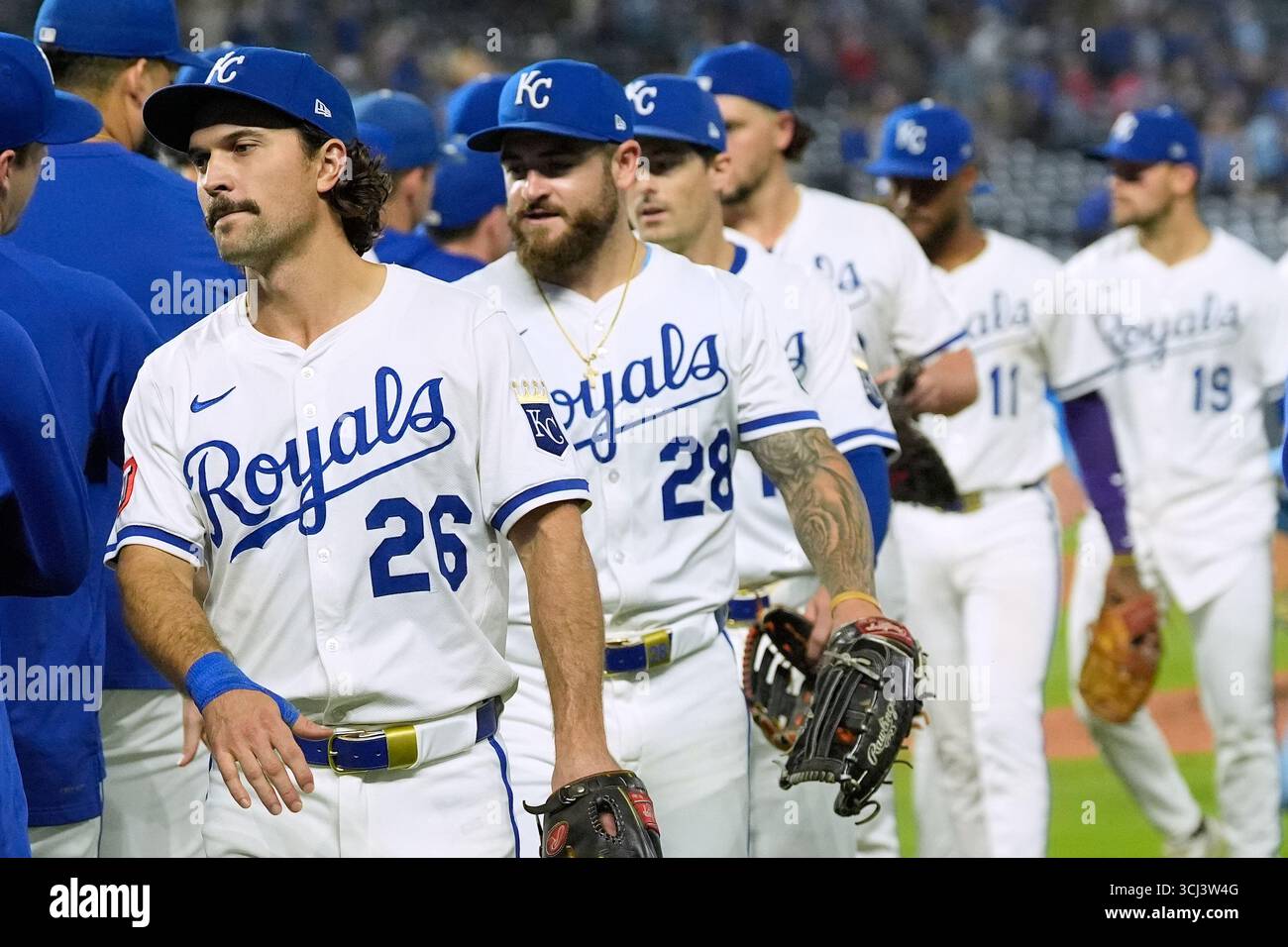 Kansas City Royals' Adam Frazier (26) celebrates with teammates after ...