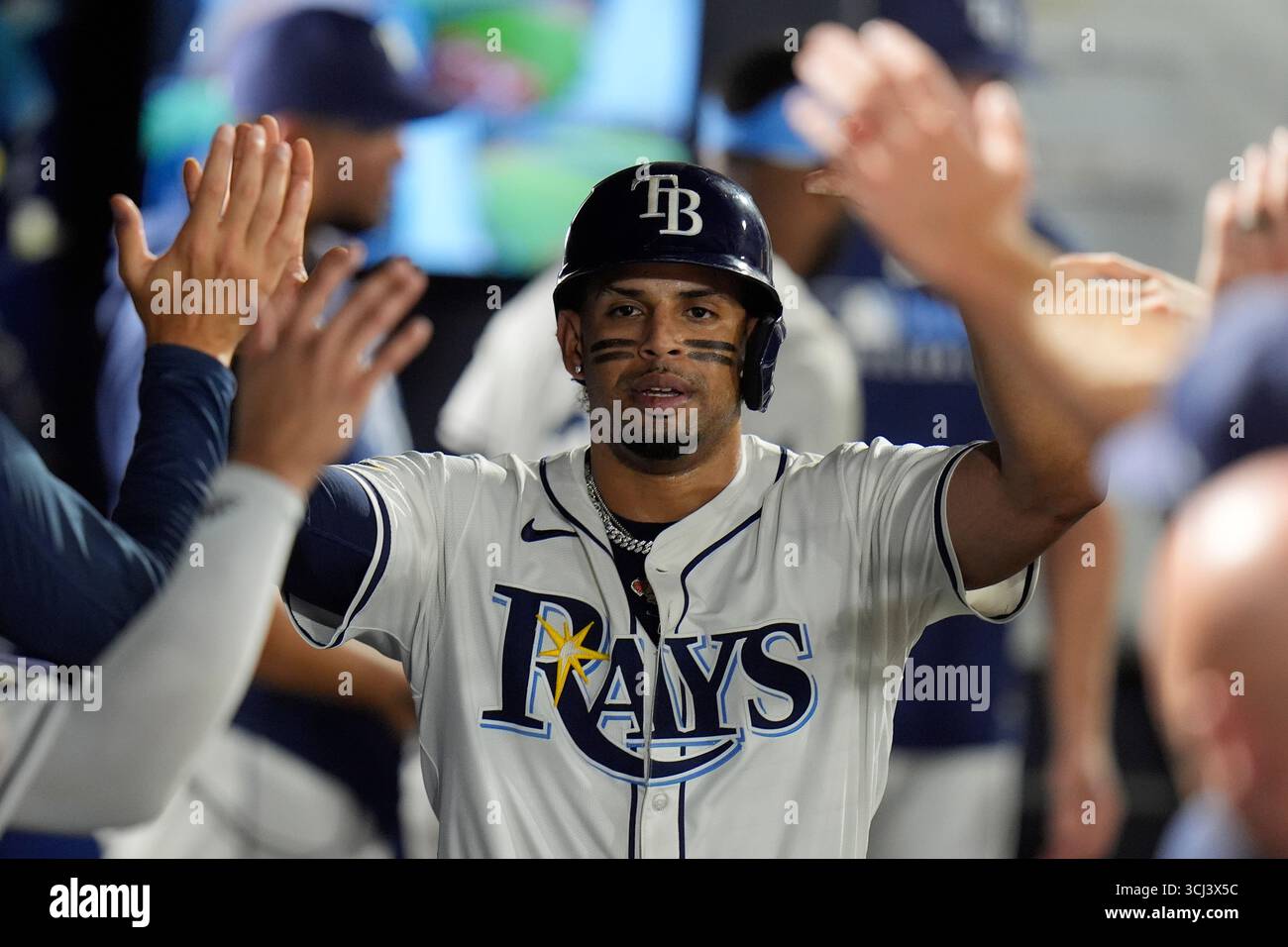 Tampa Bay Rays' Christopher Morel celebrates in the dugout after ...