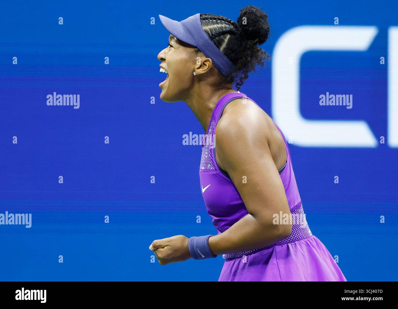 Naomi Osaka of Japan reacts after winning a 1st set tiebreak against ...