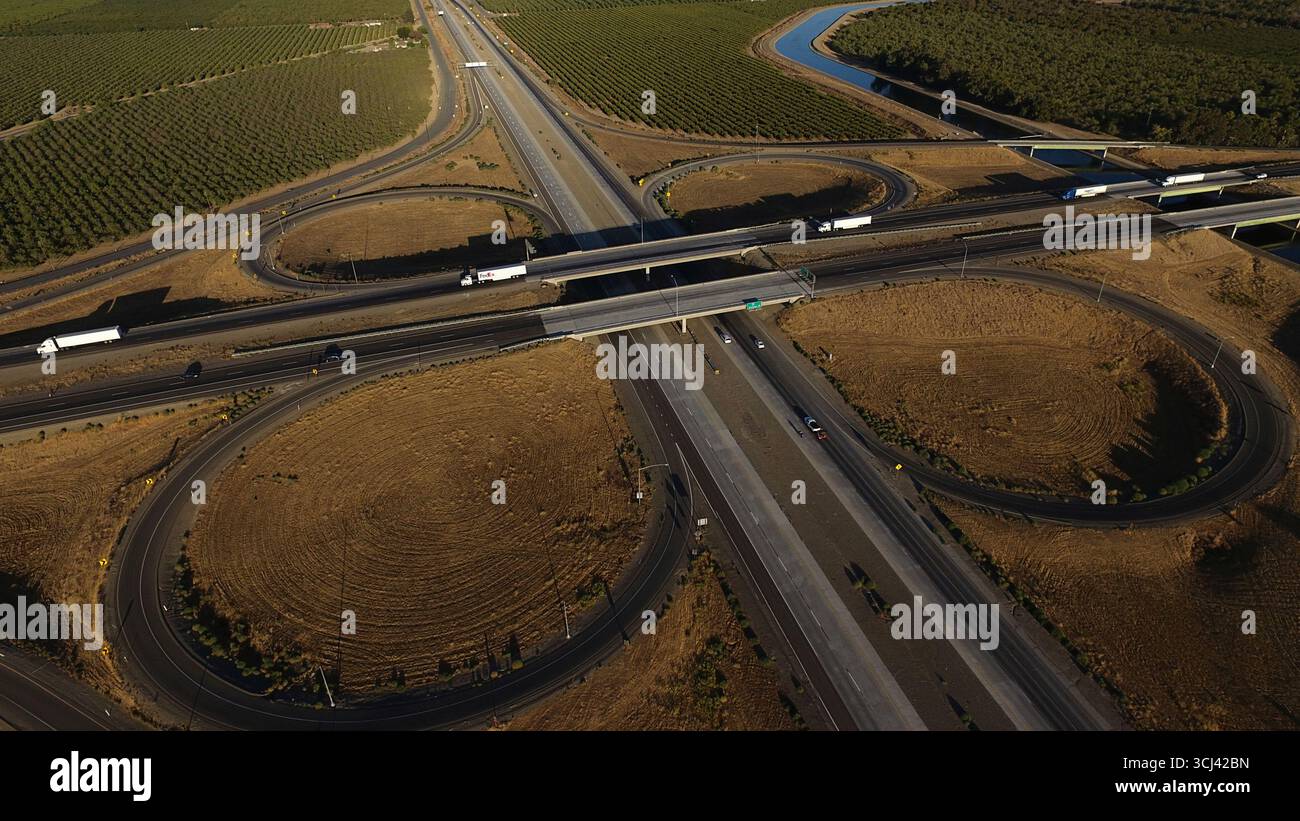 Freight trucks travel northbound on Interstate 5 Highway, Wednesday ...