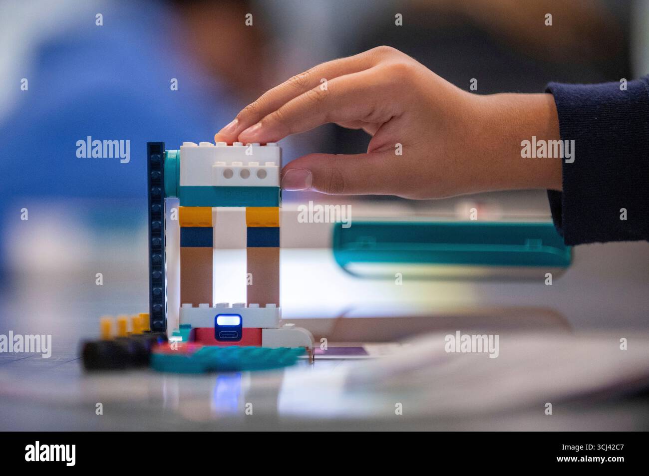 Analyssa Ramirez works on a project during a LEGO Education science ...