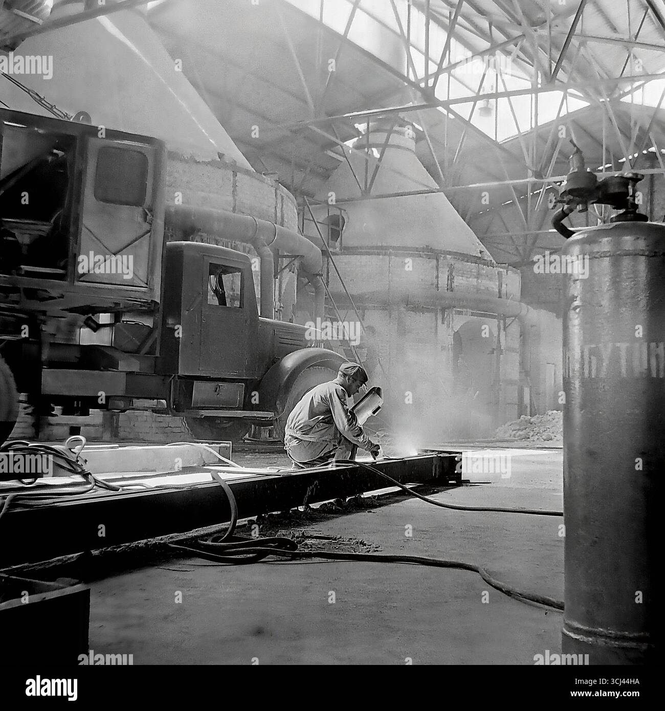 A welder at work during the construction of a new workshop at the ...