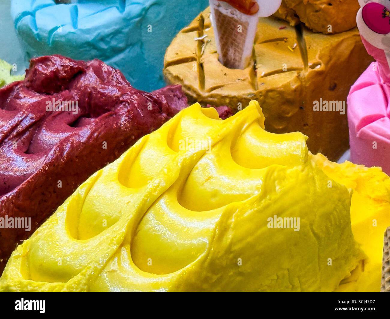 Bright gelato flavors on display. Dessert, color, and culinary art in ...
