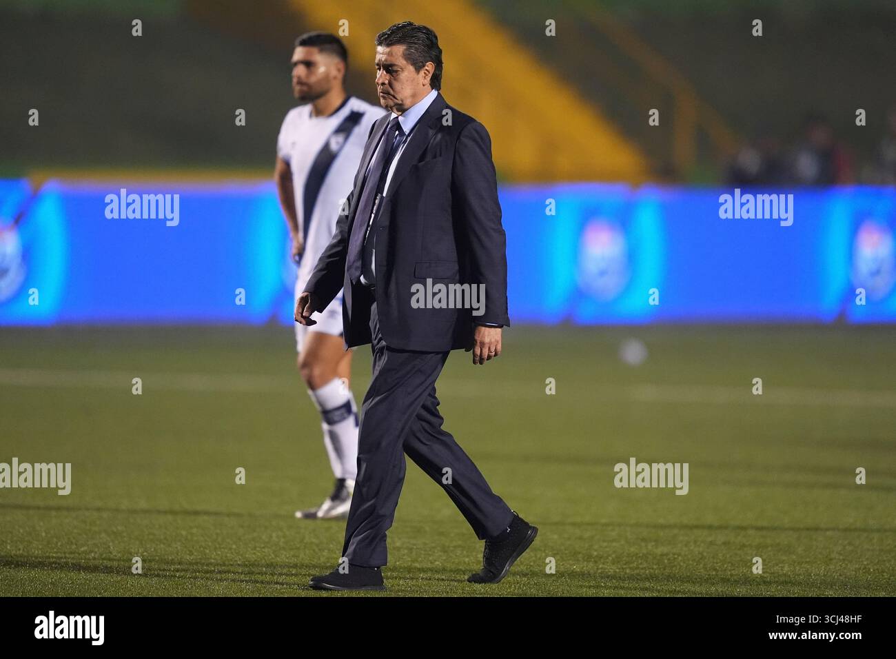 Guatemala's coach Luis Fernando Tena leaves the pitch after losing ...