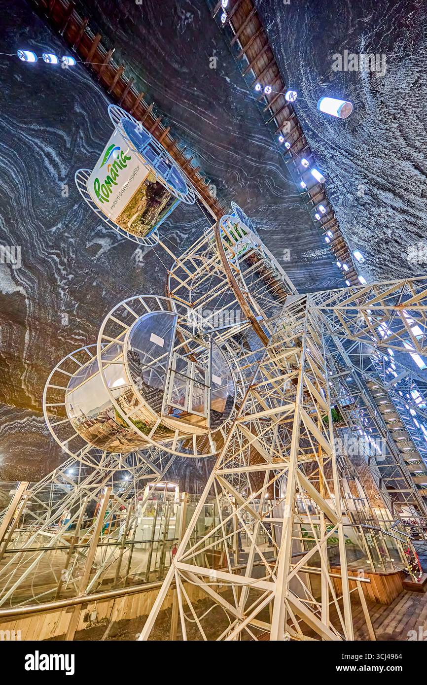 Ferris wheel at the Amusement park underground at the Salina Turda Salt ...